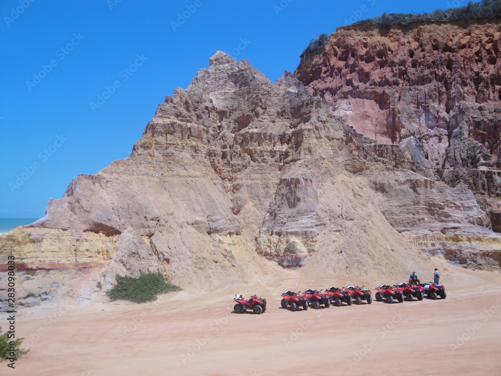 Buggy ride on Gunga Beach to see the cliffs in Alagoas, Brazil. Stock ...