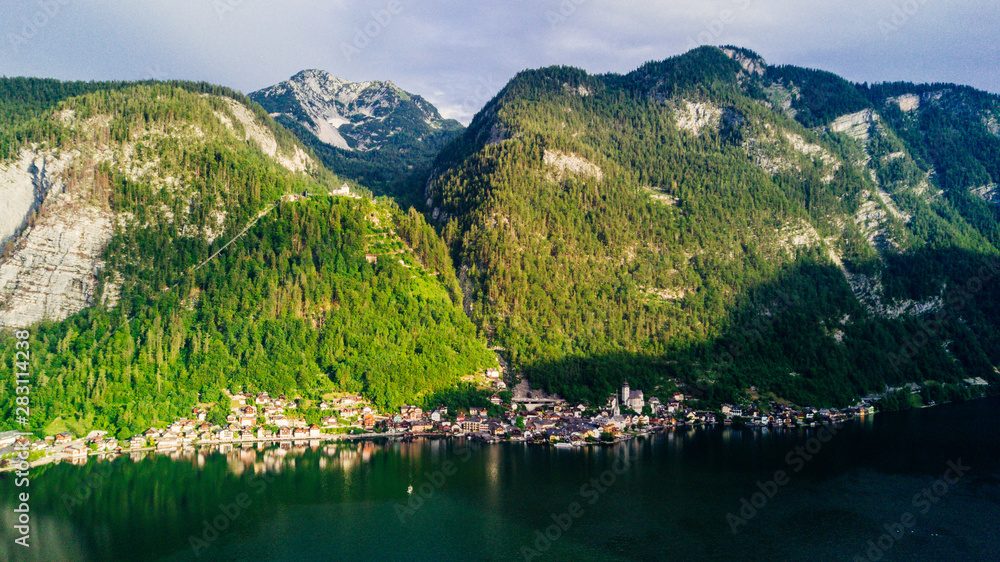 Aerial view from above on famous historical Hallstatt town on ...