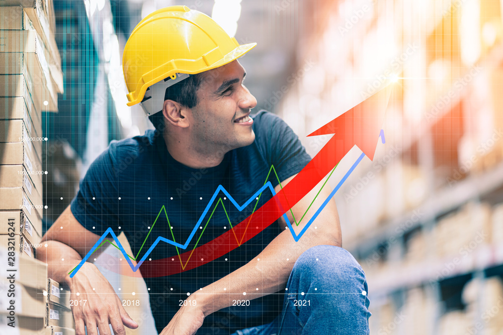 Smart Indian engineer man wearing safety helmet doing stock tick check ...