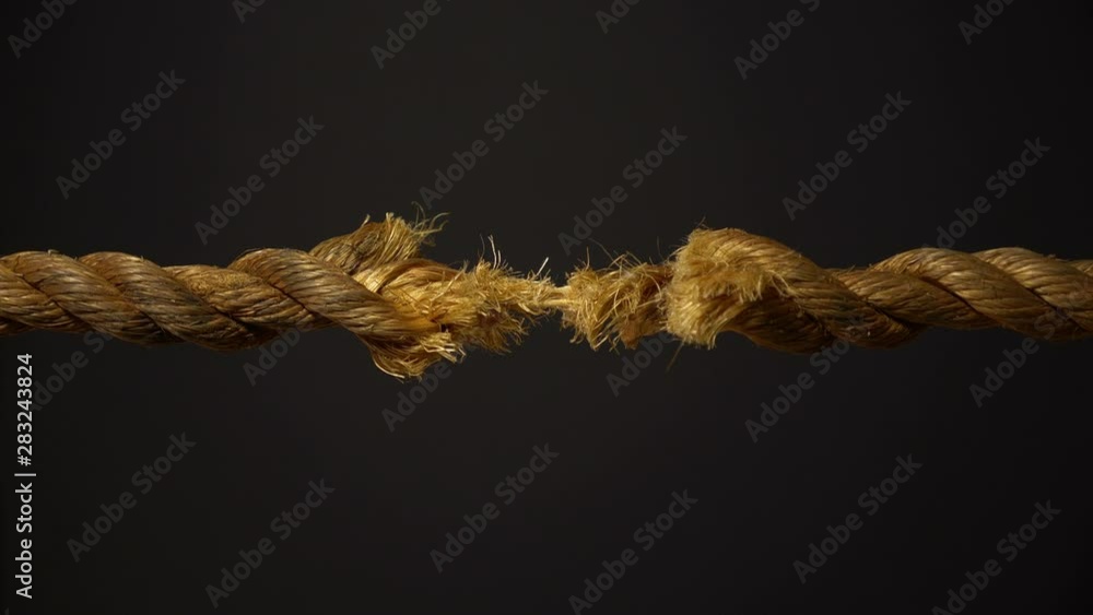 A frayed rope about to break under tension and stress Stock Video ...