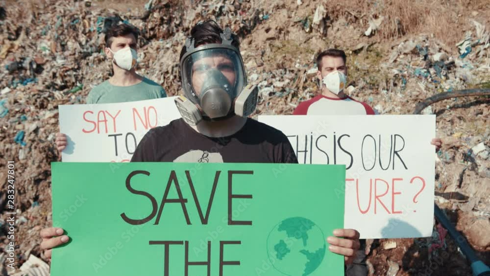 Vidéo Stock Group of men activists fighting for ecology holding ...