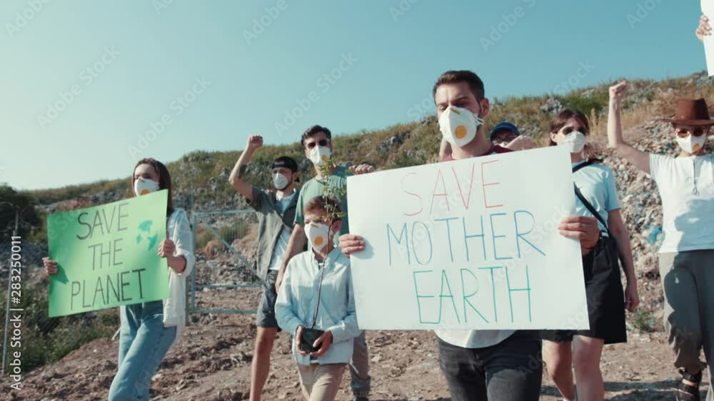 Environmental movement concept. Group of vigorous young people fighting ...