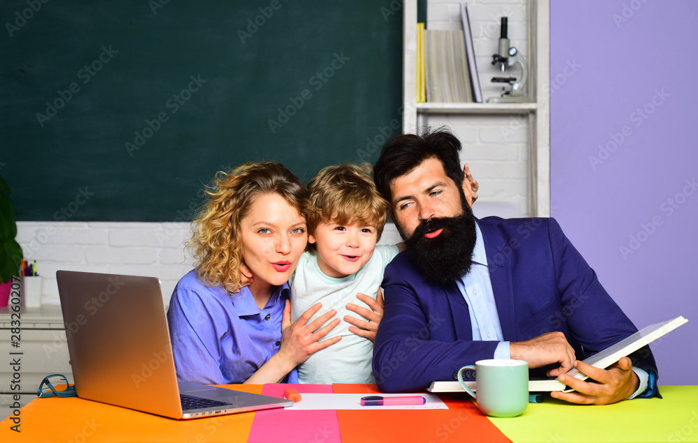 School concept. School boy in first grade. Happy family schooling math ...