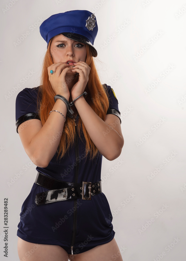 Sexy police, close up studio isolated shot Stock Photo | Adobe Stock