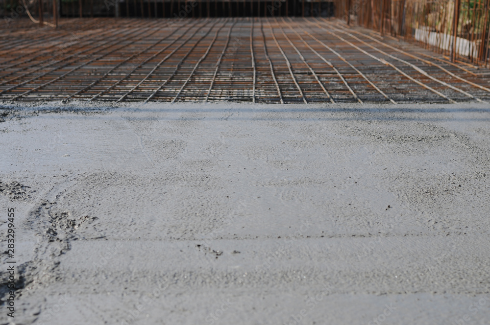 Concrete pouring during commercial concreting floors of buildings in ...