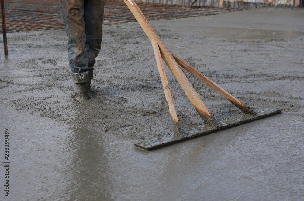Concrete pouring during commercial concreting floors of buildings in ...