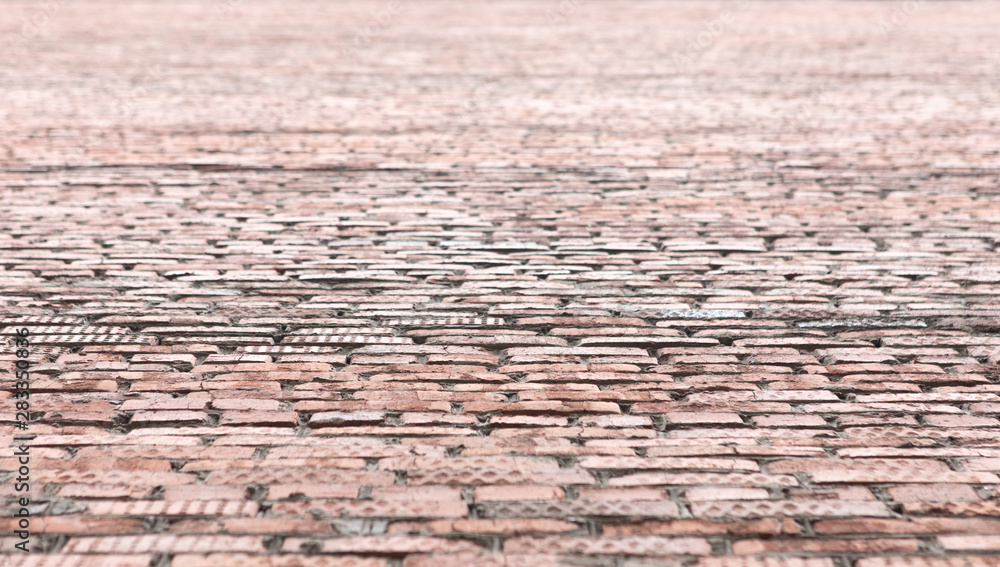 View on a brick wall of building. Perspective of brick background Stock ...