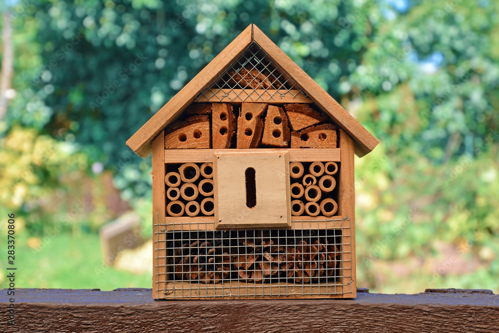 Small wooded insect house hotel used in gardens, a structure created to ...