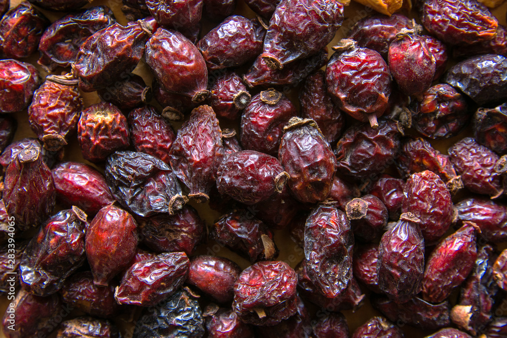 Heap of organic sun dried fruits berries dehydrated rose hip. Healthy ...