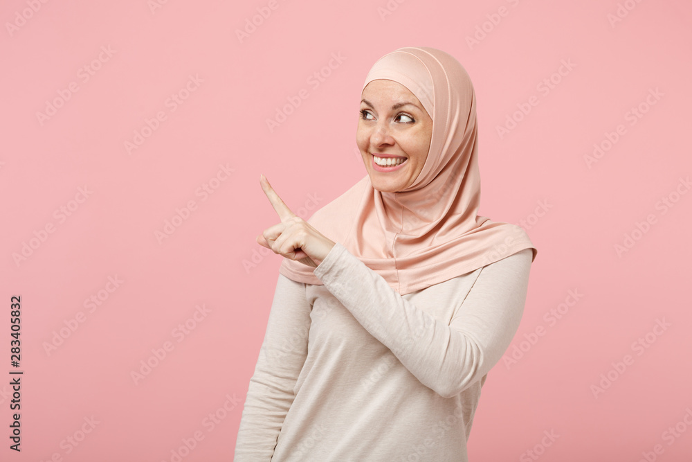 Pretty young arabian muslim woman in hijab light clothes posing ...