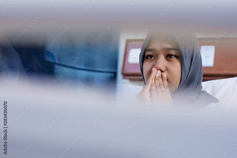 asian hijabi Muslim female patient on the hospital bed room shocked to ...
