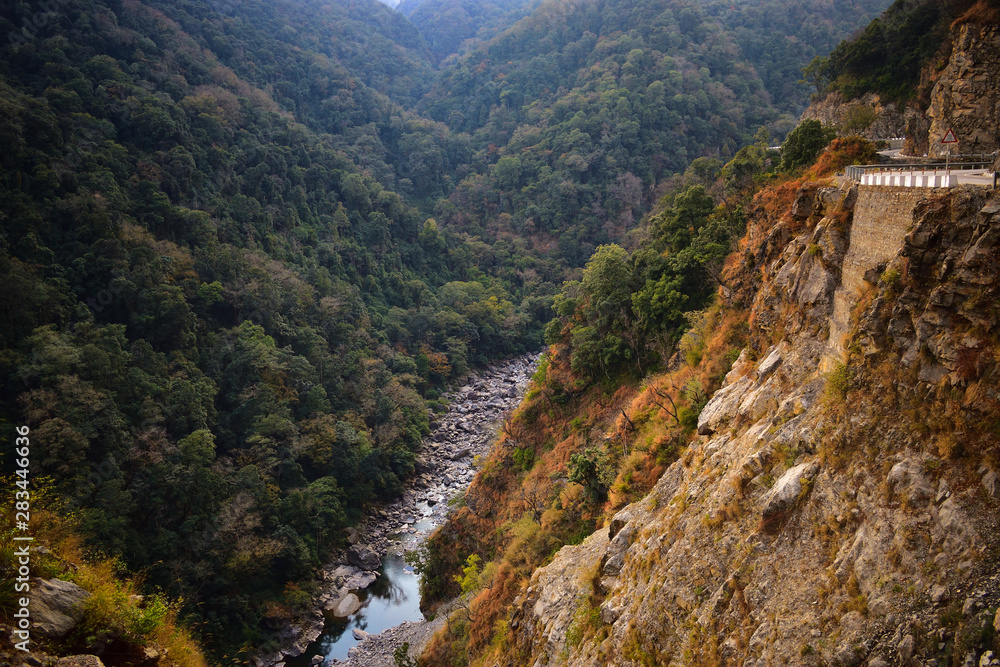 Canyon of mountain river on steep slopes, misty canyon, flashy river ...