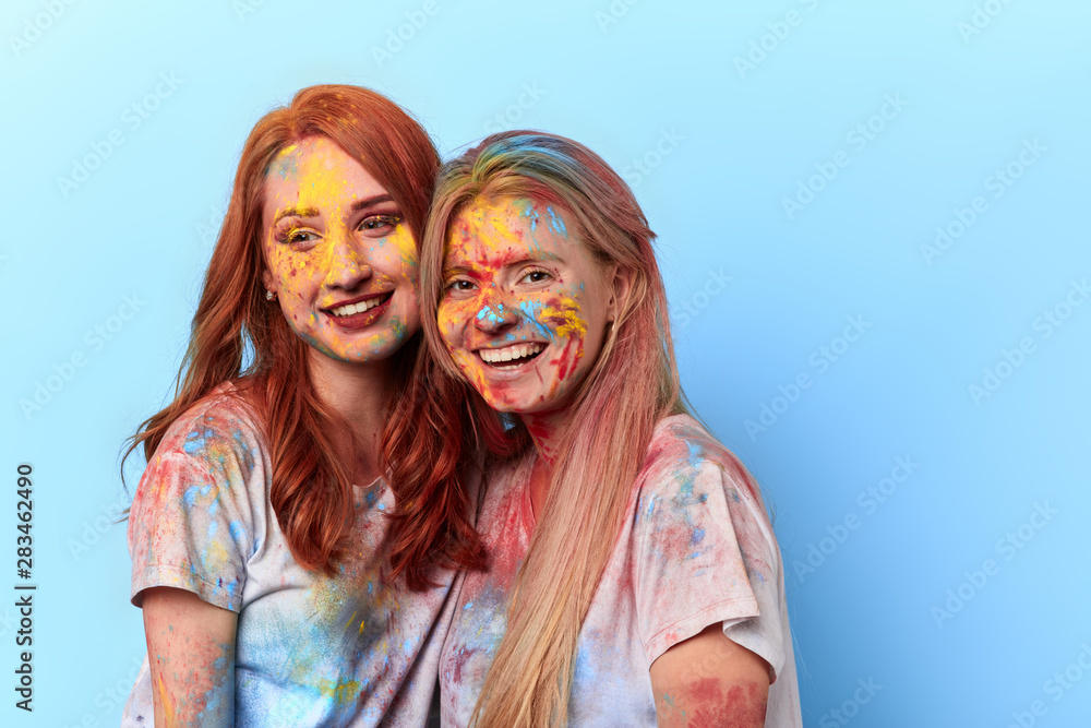 beautiful charming girls have attended festival of colours. close up ...