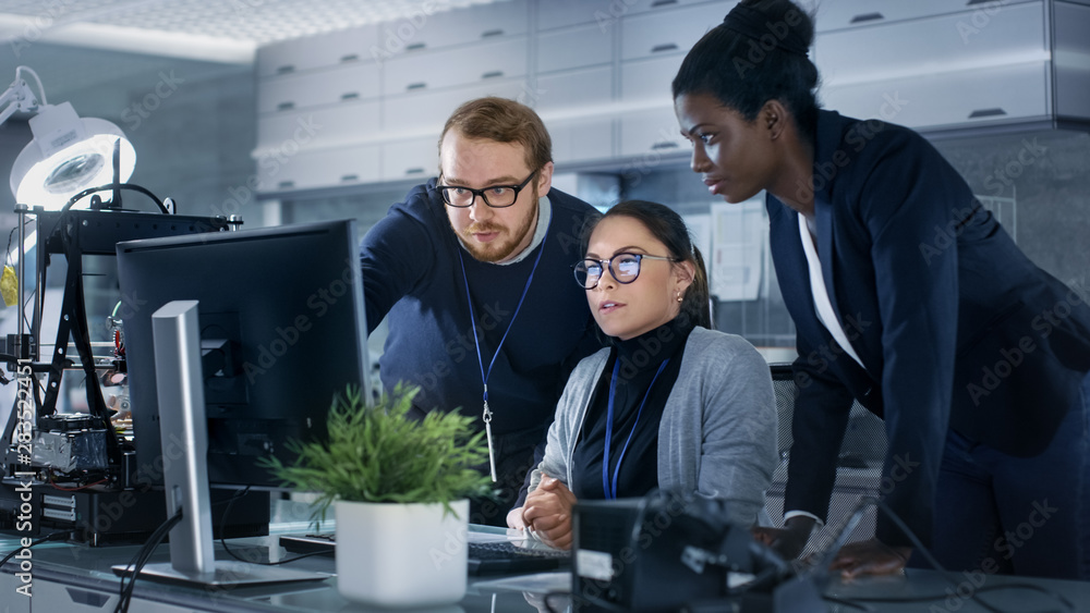 Diverse Team of Research Engineers Working in a high Tech Laboratory on ...