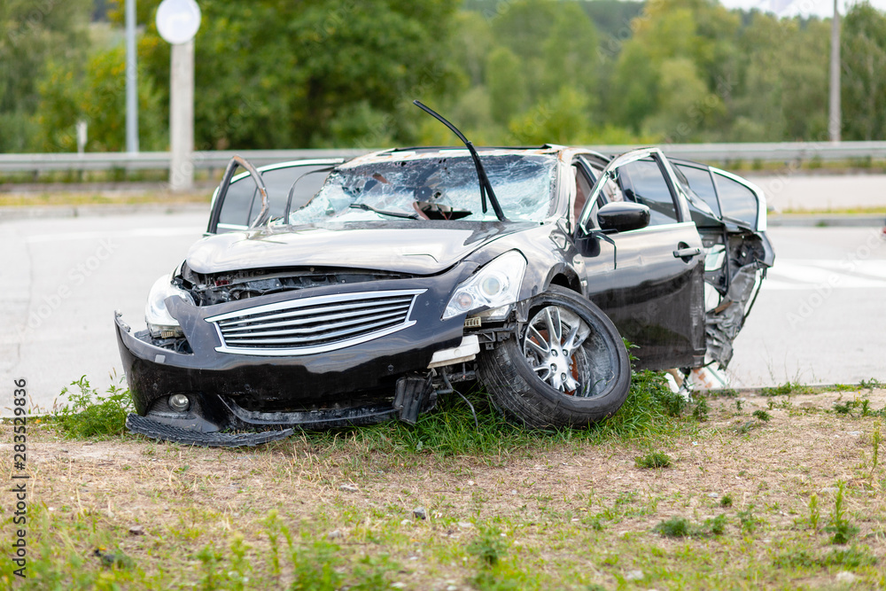 Wrecked car on side of highway. Safety on road. Accident or crash ...