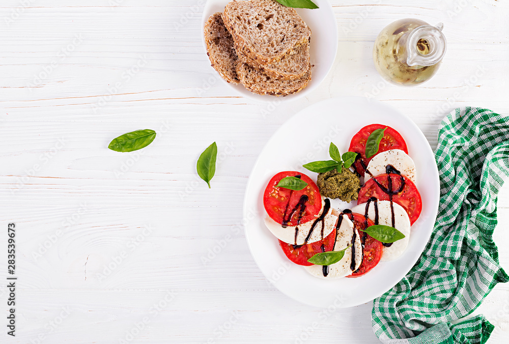 Traditional Italian Caprese Salad with mozzarella, tomato, basil and ...