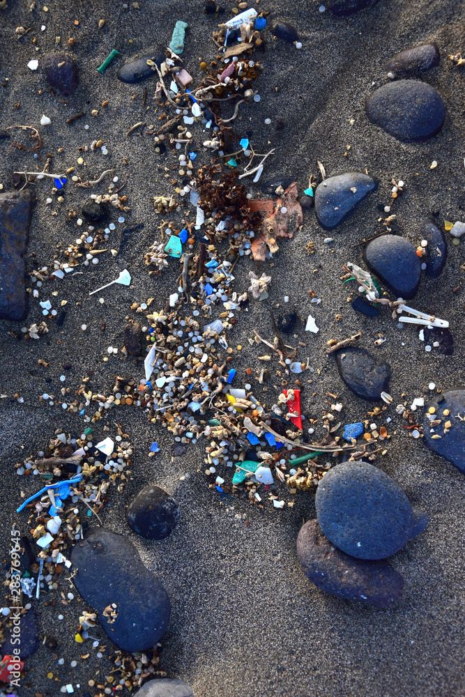 Microplastics on a beach. Famara Beach, Lanzarote. Stock Photo | Adobe ...