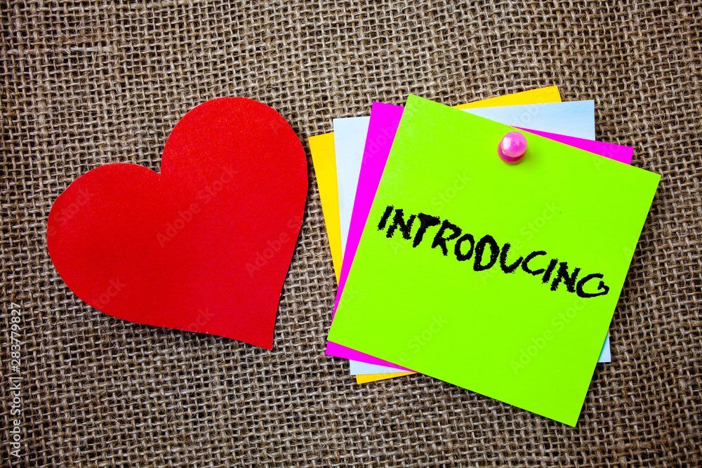 Text sign showing Introducing. Conceptual photo Presenting a topic or ...