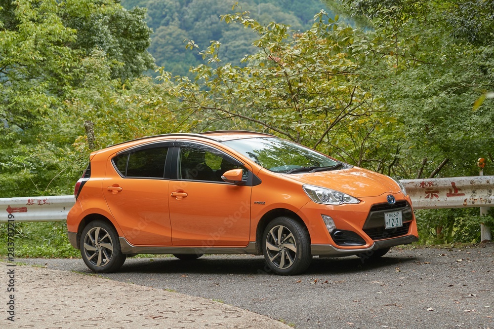 KASAGI, JAPAN - SEPTEMBER 16, 2018: Toyota Aqua compact car on a ...