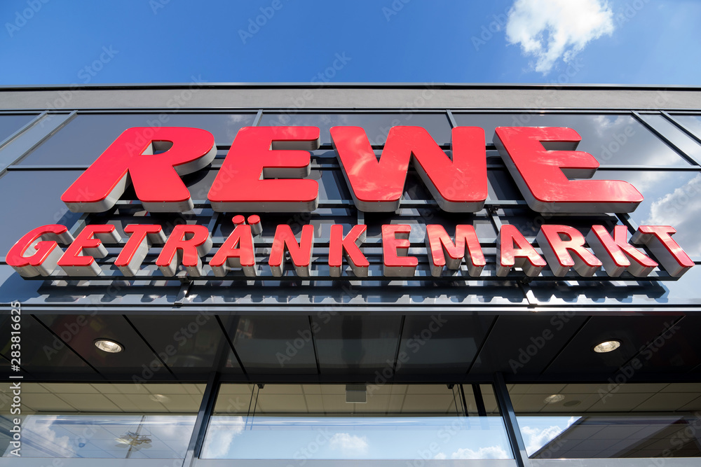 WIEHL, GERMANY - September 3, 2017: Sign at REWE beverage store. REWE ...
