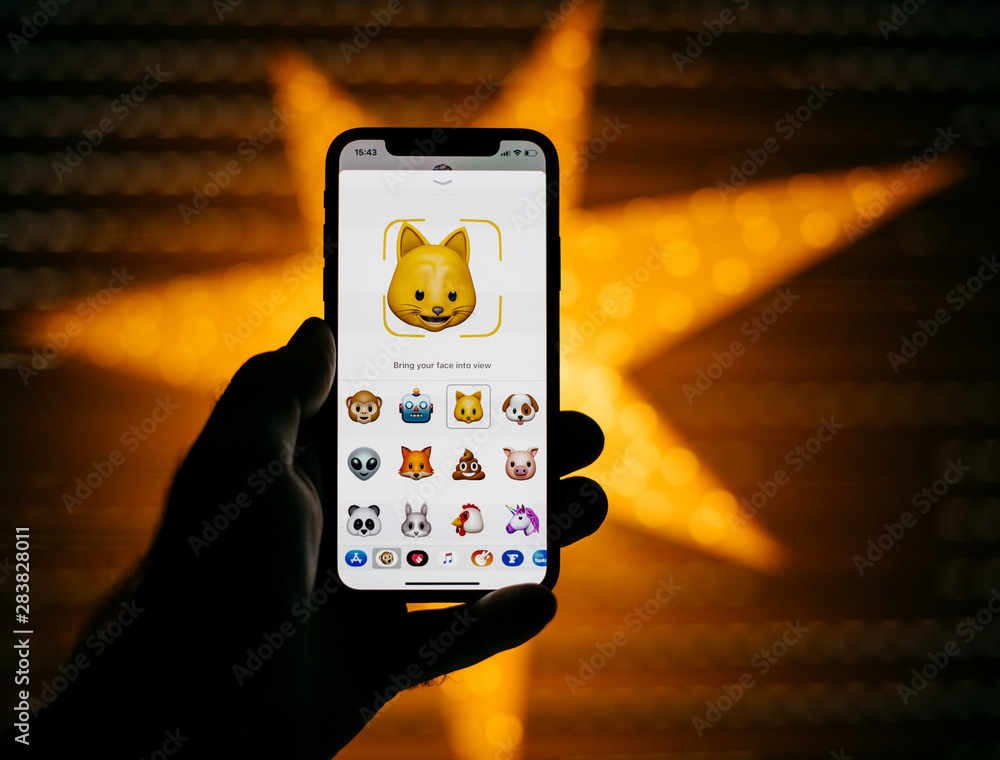 PARIS, FRANCE - NOV 10 2017: Cat 3d Animoji emoji generated by Face ID ...