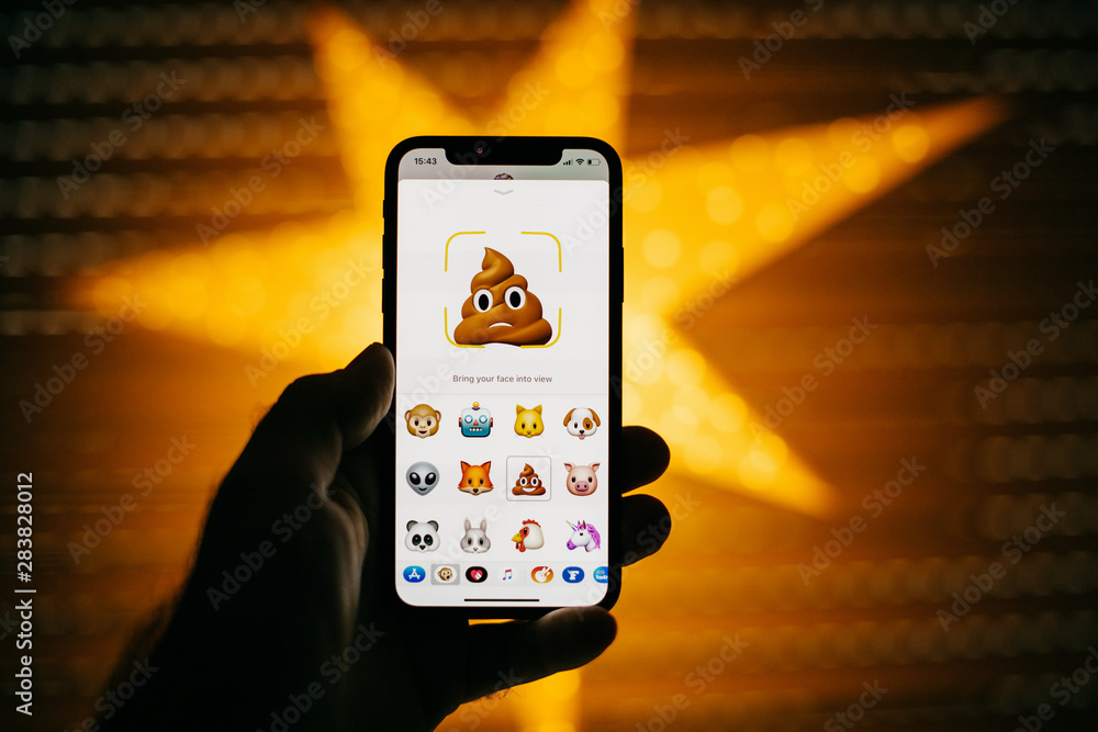 PARIS, FRANCE - NOV 10 2017: poop 3d Animoji emoji generated by Face ID ...
