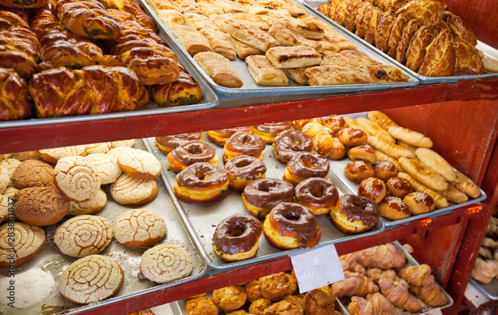 Street bakery selling fresh pastry on a colorful Puebla streets in ...