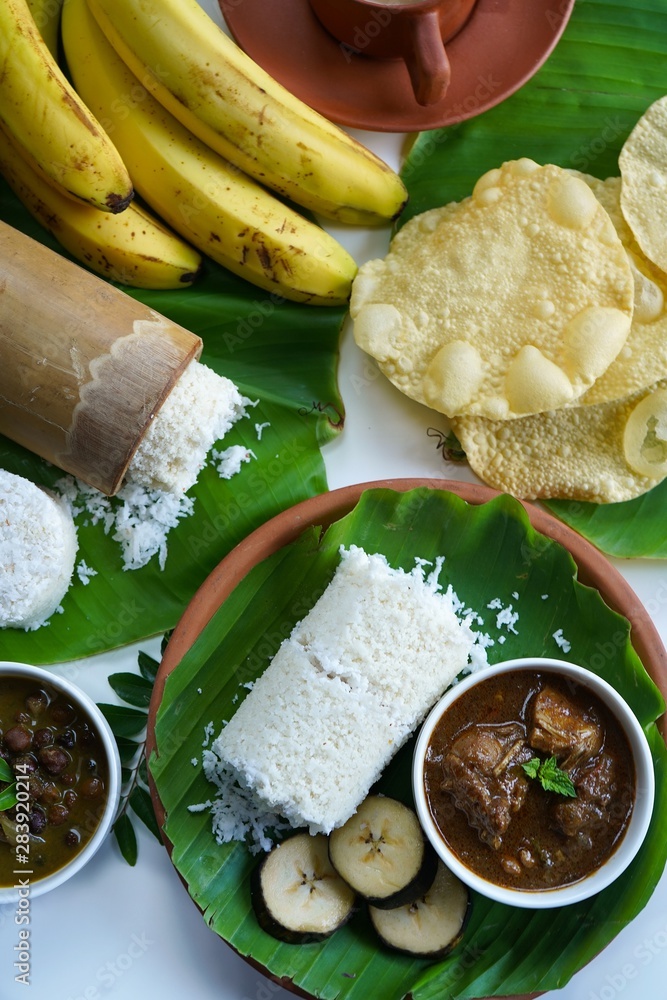 Kerala breakfast rice Puttu /Pittu made in bamboo mould served with ...