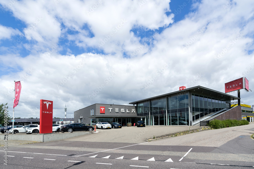 ROTTERDAM, THE NETHERLANDS - June 21, 2018: Tesla store. Tesla is an ...