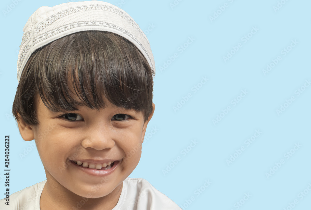 Muslim boy in a dress , isolate background Stock Photo | Adobe Stock