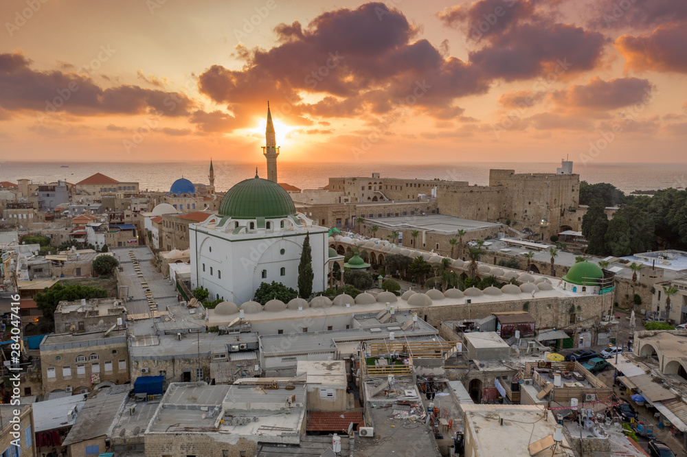 Aerial summer sunset view of Acco, Acre, Akko medieval old city with ...