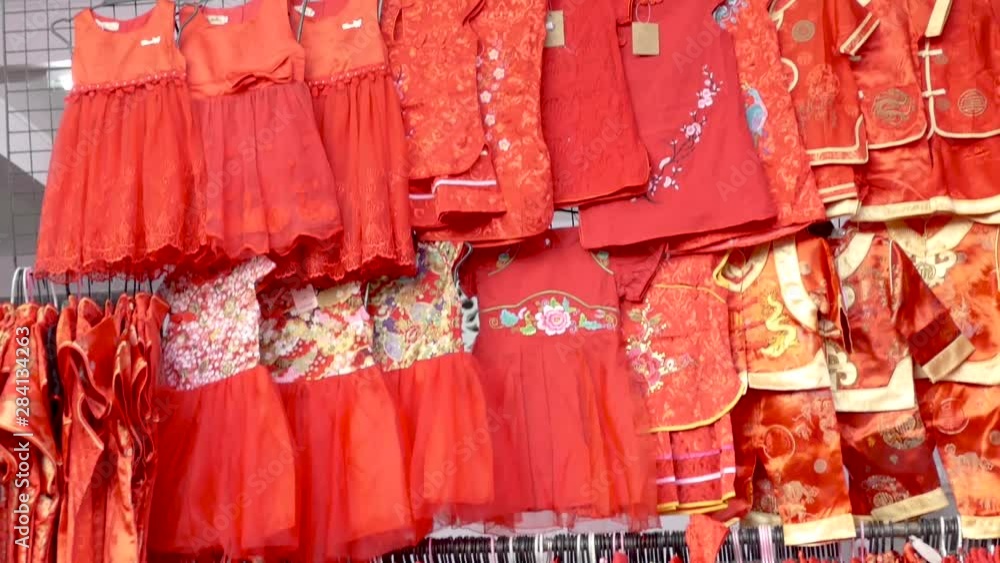 Vidéo Stock The footage of Red Chinese Costumes for boys and girls are ...