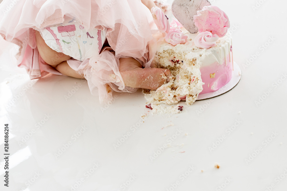 Crash pink cake at the celebration of the first birthday of the girl ...