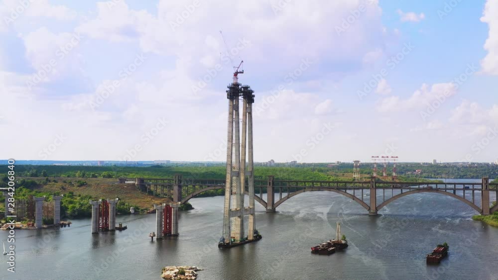 Arial of construction of bridge over Dnepr in Ukraine near hydro ...