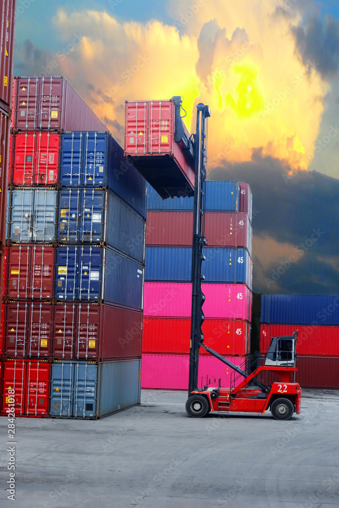 Industrial container yard with forklifts that work in shipyards to ...