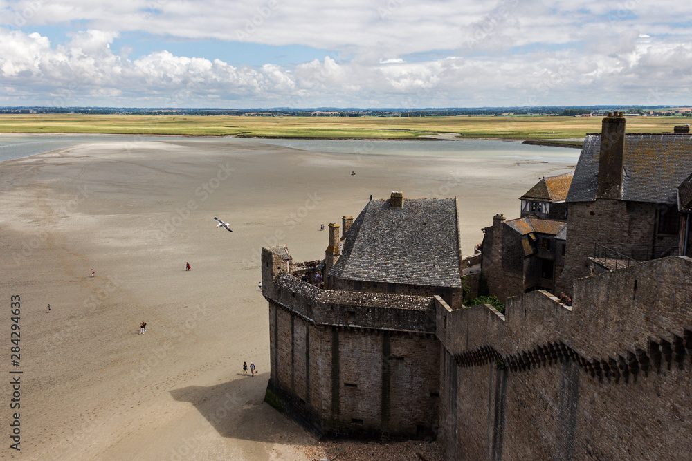Ramparts of medieval fortified abbey and village Mont Saint-Michel ...