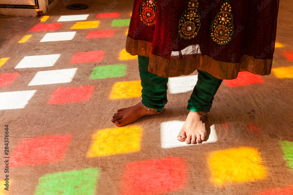 Stained glass window reflection on floor and feet, Chandra Mahal (City ...