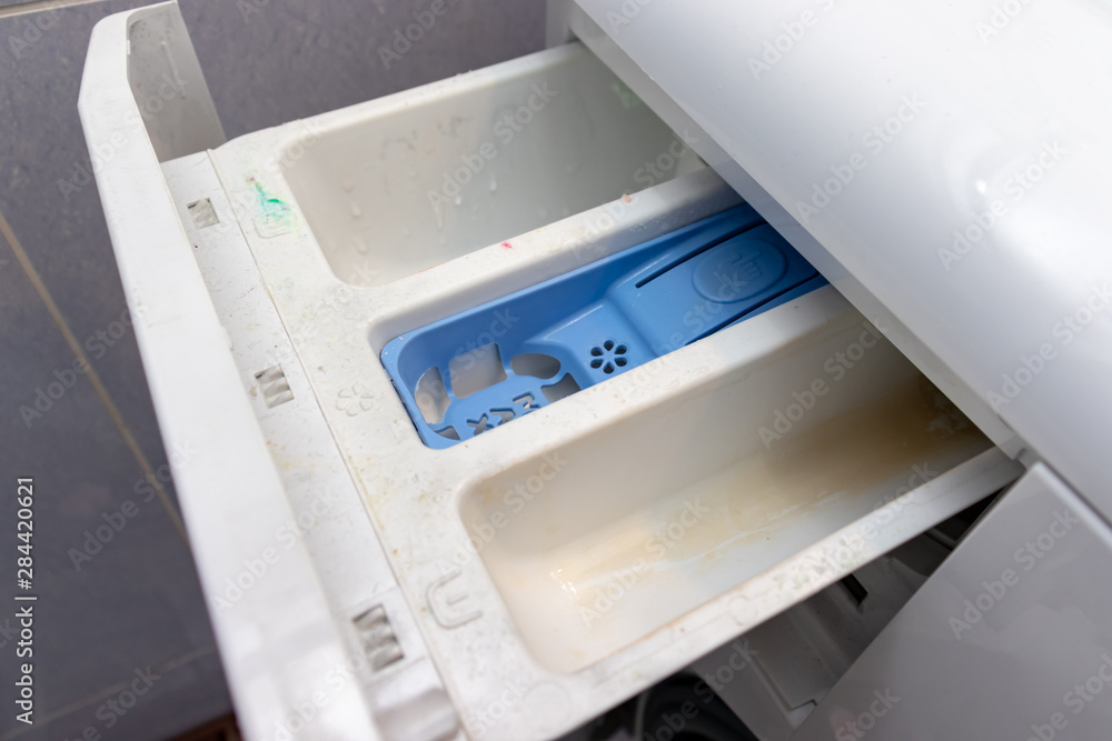 Dirty moldy washing machine detergent and fabric conditioner dispenser ...