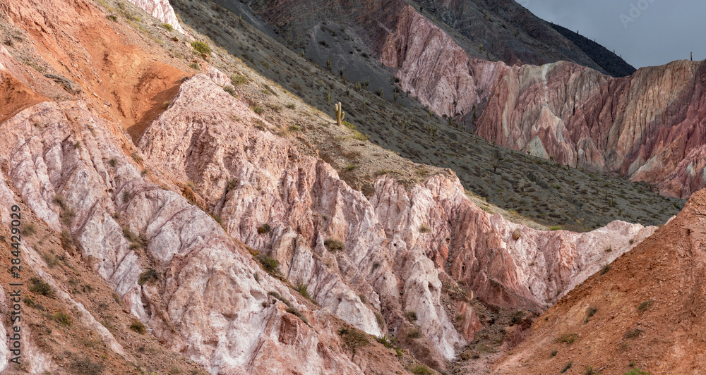 Iconic landmark, the rock formation Cerro De Los Siete Colores near the ...