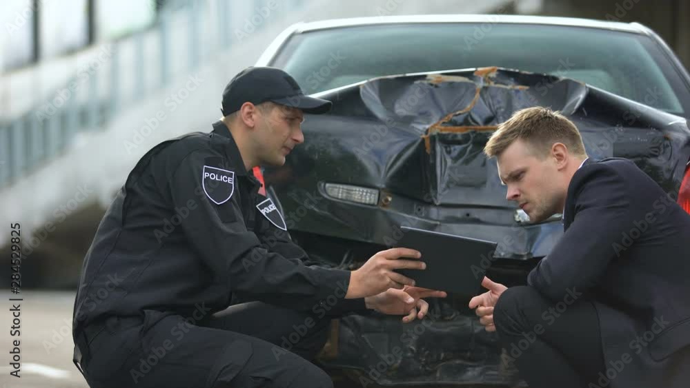 Police officer showing crashed car photos to male driver guilty in car ...