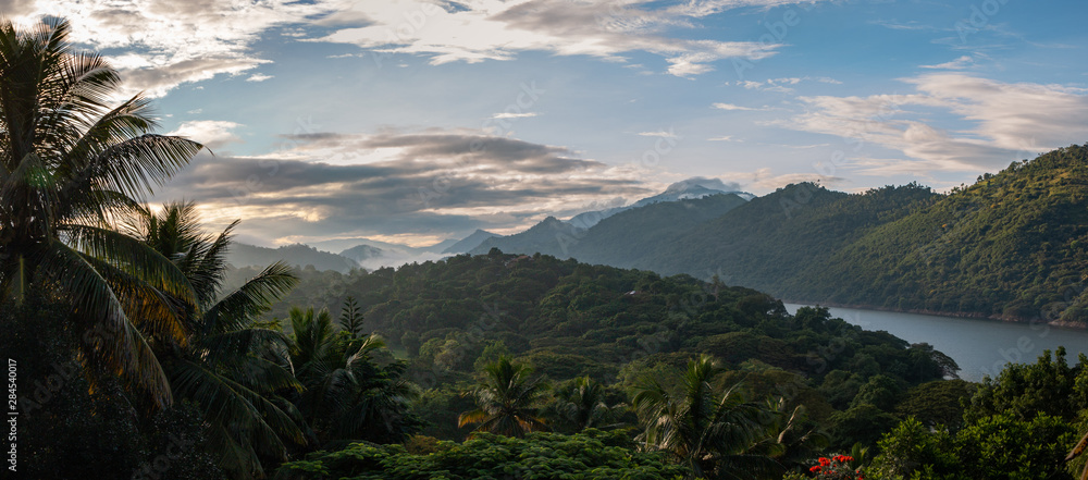 view of the mahaweli river going between mountain ranges in central sri ...
