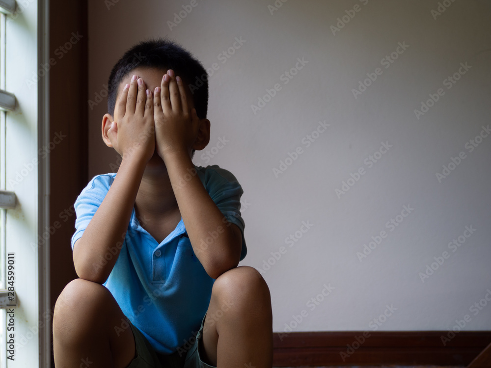 Child Crying In Corner
