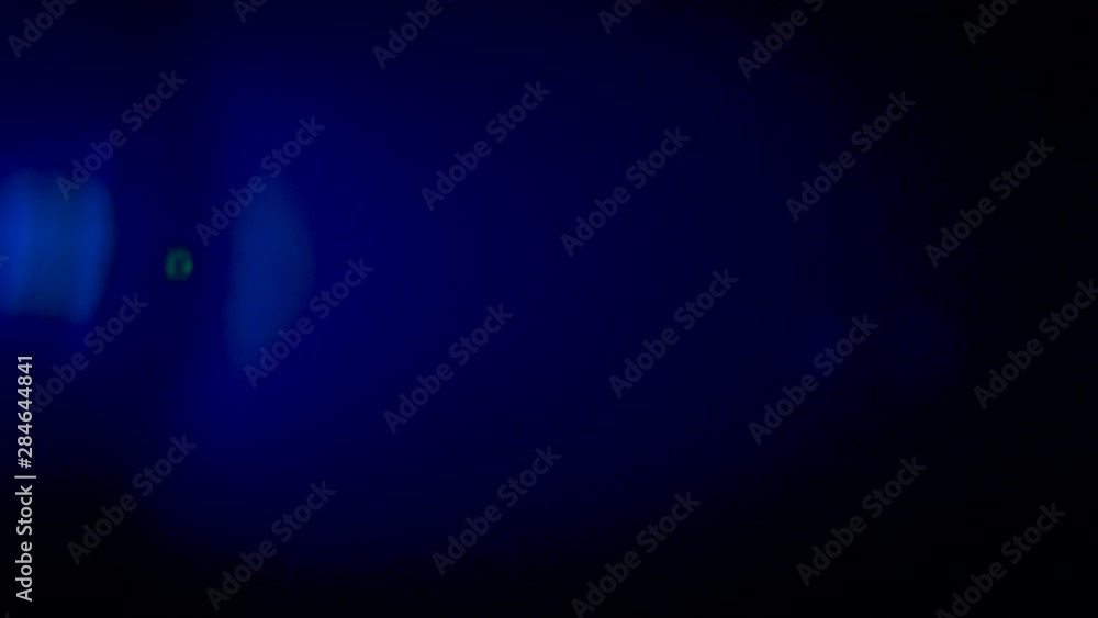 Cold lens flares isolated over black background in studio Stock Video ...