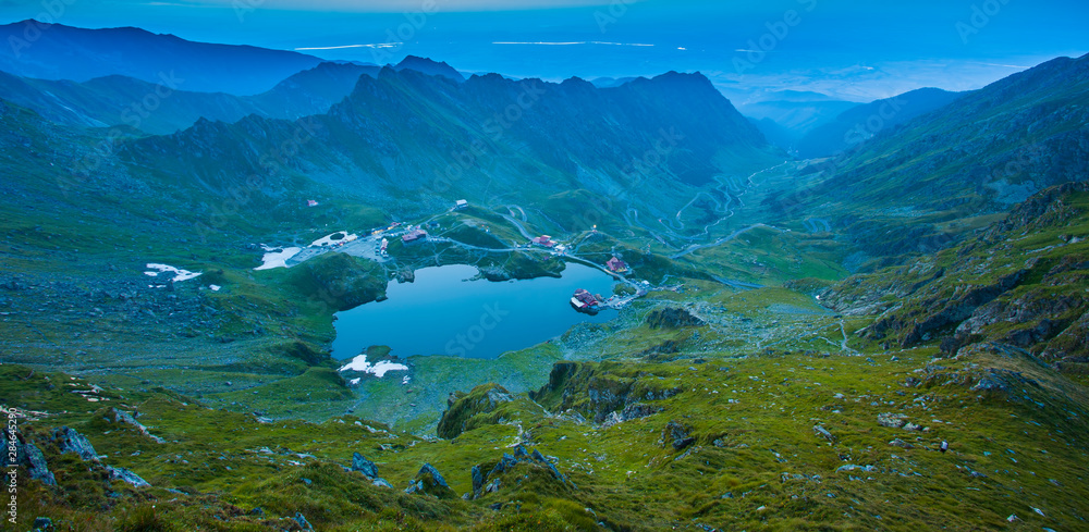 Balea lake and Transfagarasan road in Fagaras mountain. Romania at ...