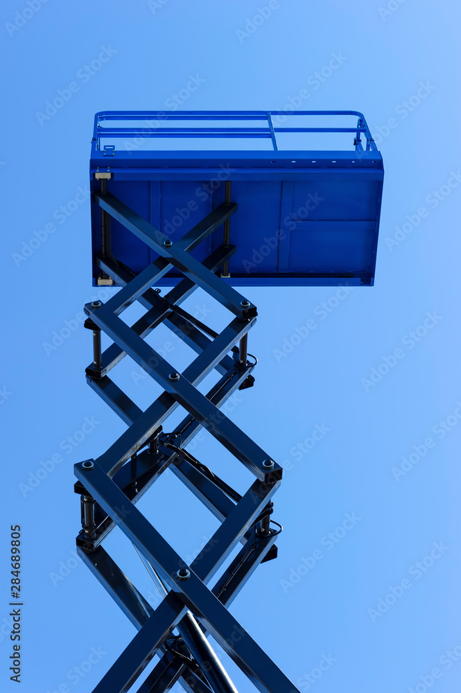 Scissor lift platform with bucket, construction machine, heavy industry ...