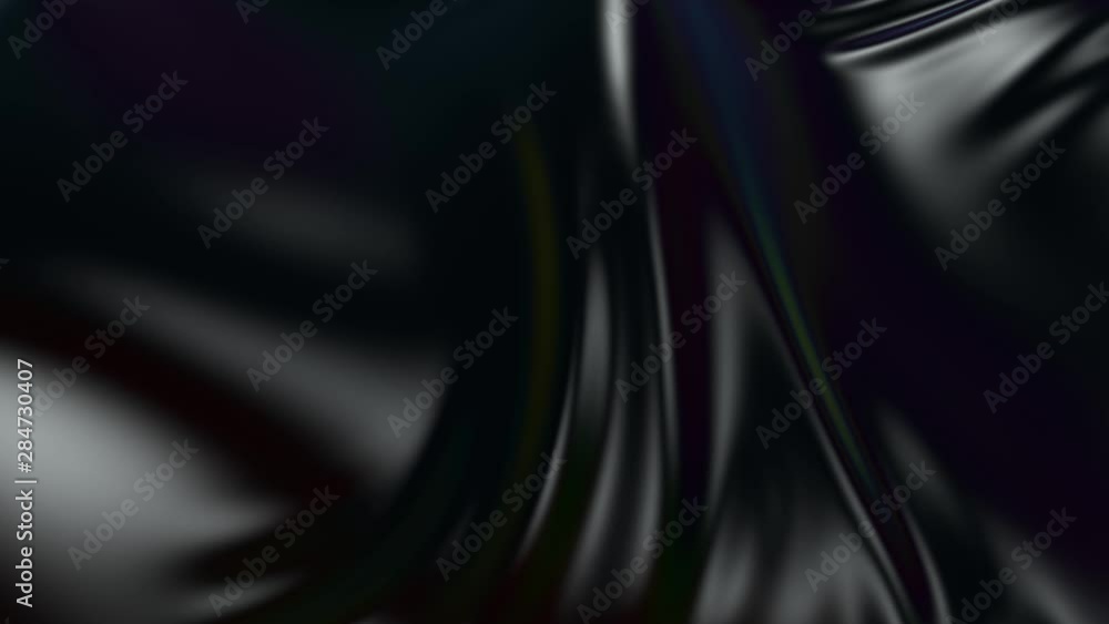 Abstract black silky fabric forms beautiful folds in the air in slow ...