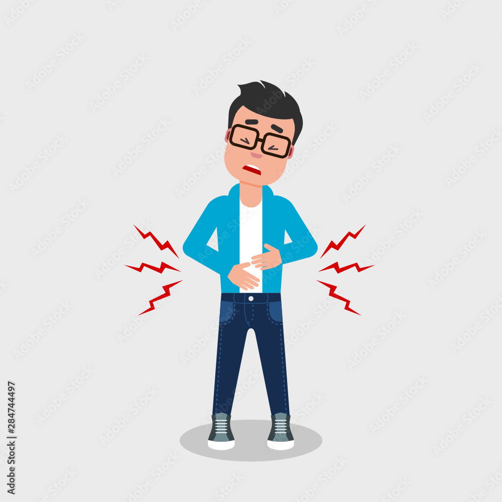 Naklejka Young guy with glasses having stomach ache. Digestive problems ...