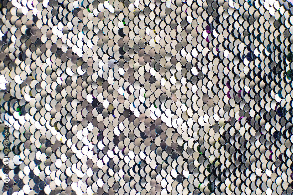 Pieces of cloth with silver sequins. Glitter background. Sequin texture ...
