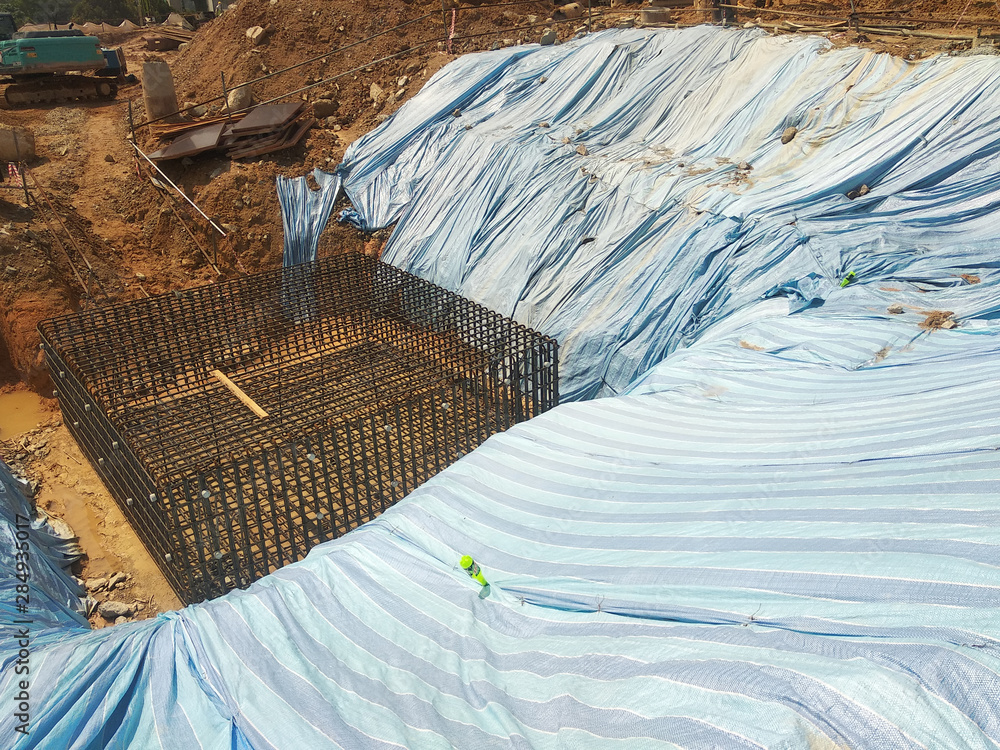 Temporary slope protection during construction using the plastic sheets ...