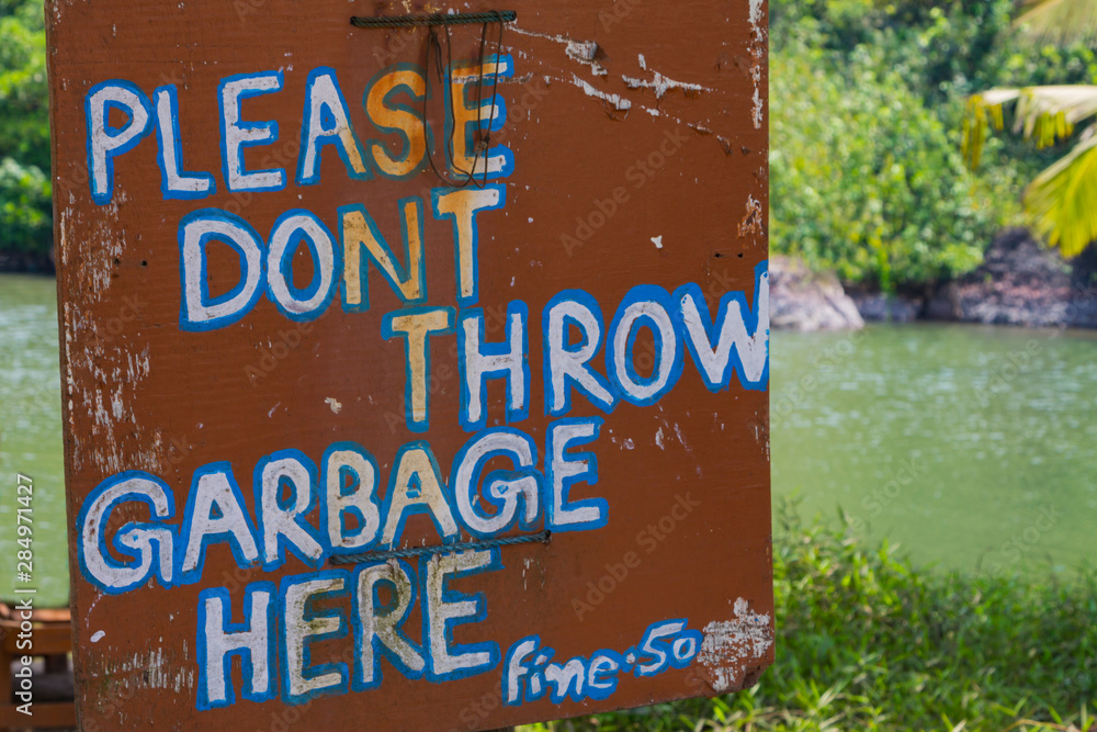 Warning sign Please dont throw garbage fine-50 on green natural ...